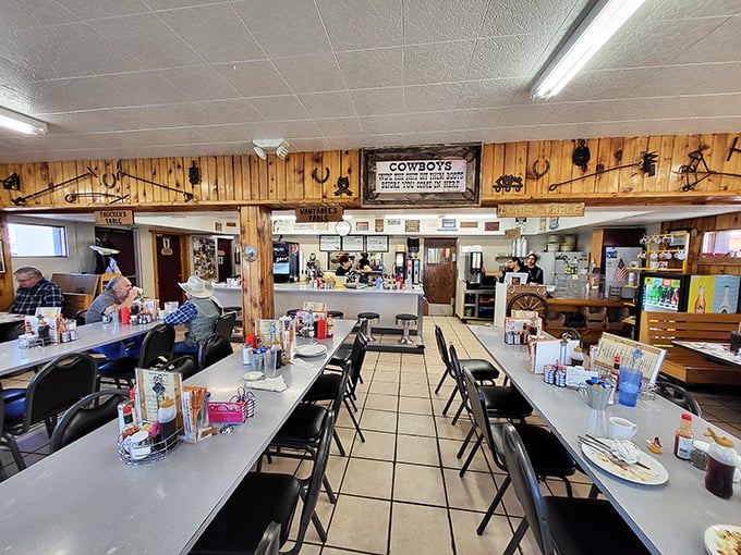 Step inside and feel the warmth! Sandy's interior is like a hug from your favorite cowboy grandma &ndash; cozy, charming, and filled with the promise of good eats.