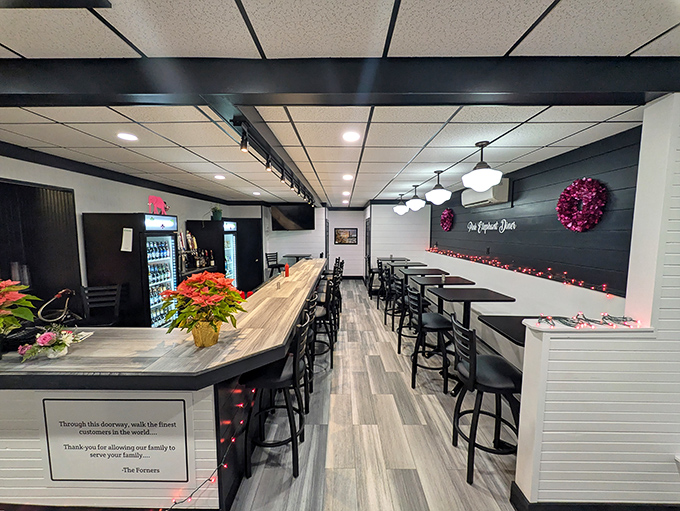 Step into a monochrome dream with pops of pink. This sleek interior is where modern chic meets retro charm.