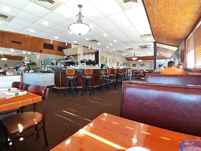 Step into a time machine of taste! Delano's interior is a cozy blend of retro charm and modern comfort, where every booth tells a delicious story.