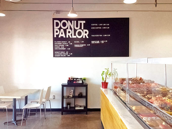 Minimalist chic meets donut dreams. The clean, modern interior lets the star attractions shine. It's a gallery where the art is edible!