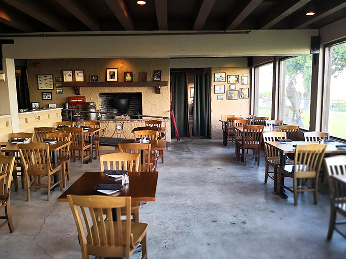 Cozy up in history! The interior's rustic charm and wartime memorabilia create an atmosphere that's part mess hall, part memory lane.