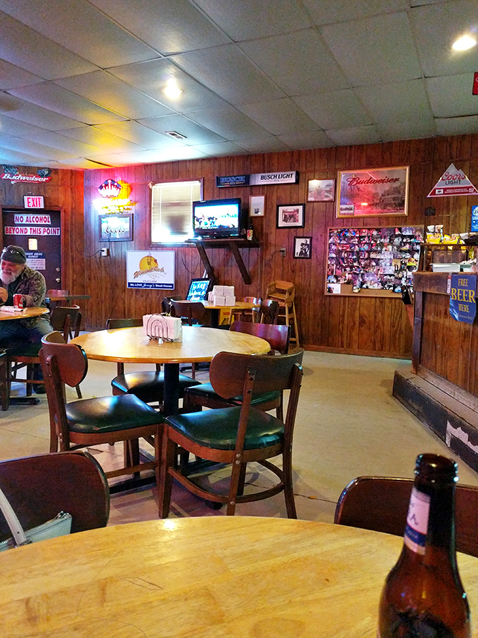 Step into a time capsule of comfort. This wood-paneled wonderland is where steak dreams come true.