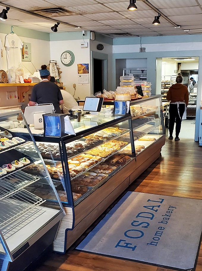 Inside the bakery, gleaming display cases showcase an irresistible array of freshly made treats waiting for their forever homes.