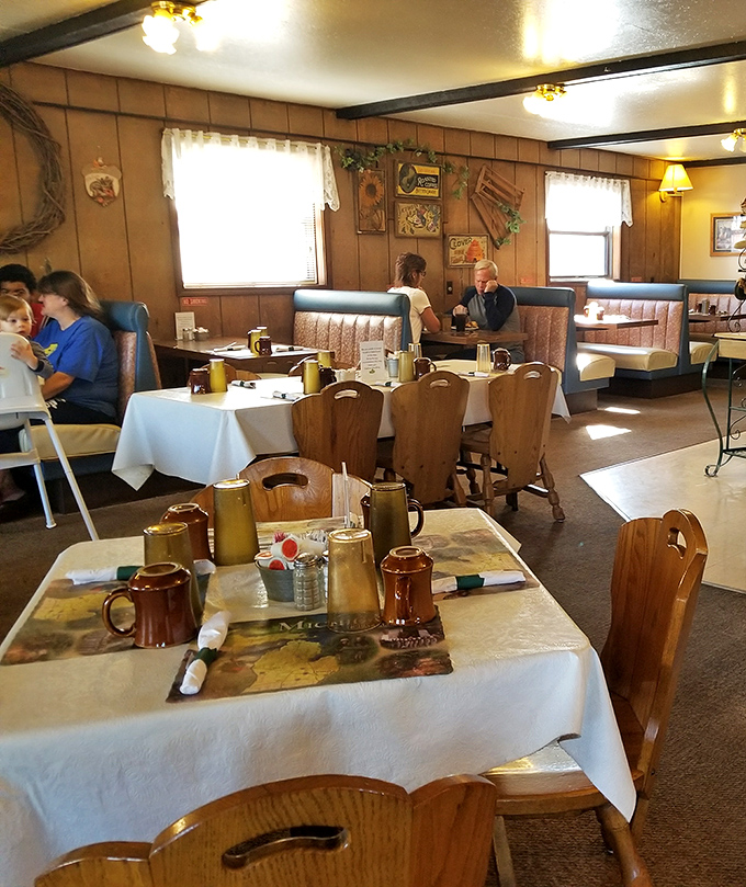 Step into a time machine of taste! This cozy interior whispers tales of comfort food and friendly faces that'll warm your heart faster than grandma's apple pie.