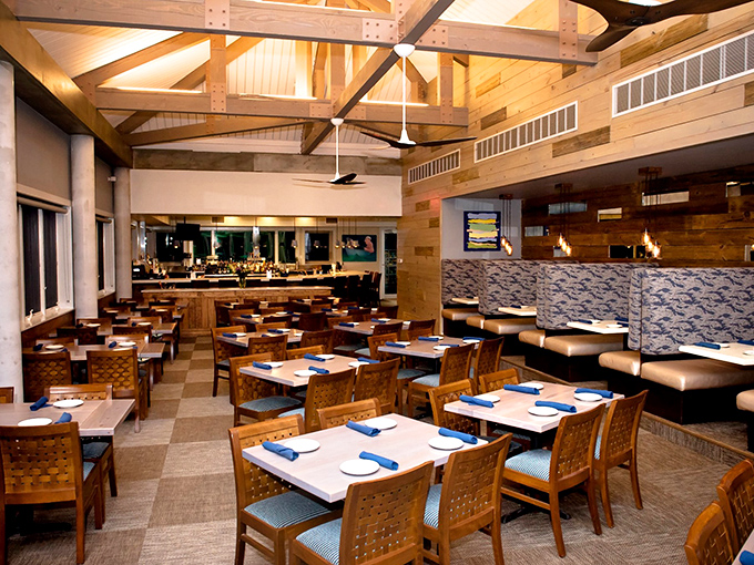 Step inside and feel the beach vibes wash over you. This isn't just a dining room; it's a coastal retreat with a side of comfort food.