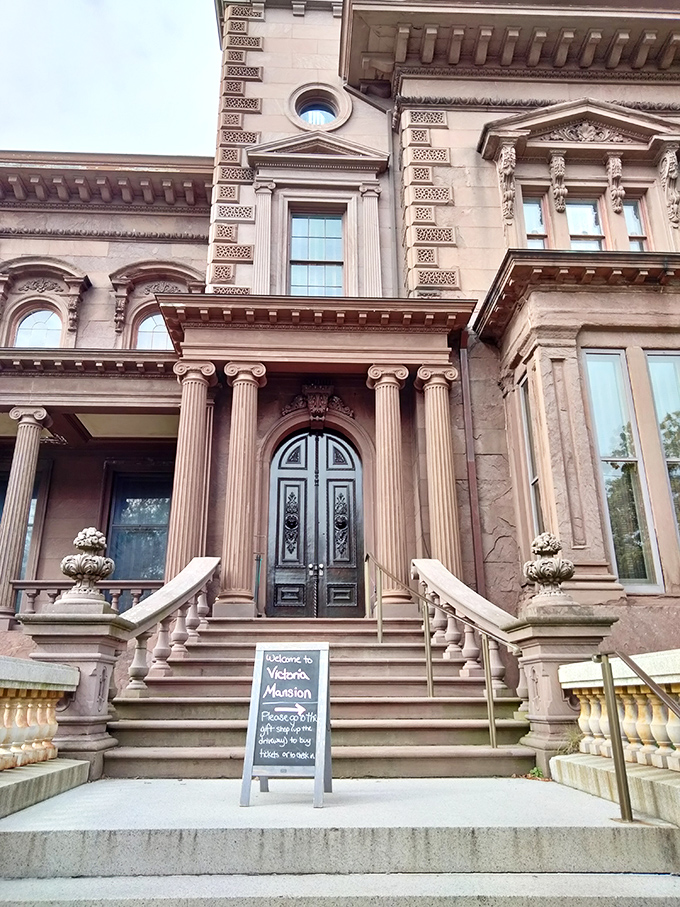 "Welcome to Victoria Mansion," the sign whispers. But the grand entrance screams, "Prepare for a time-traveling adventure!"