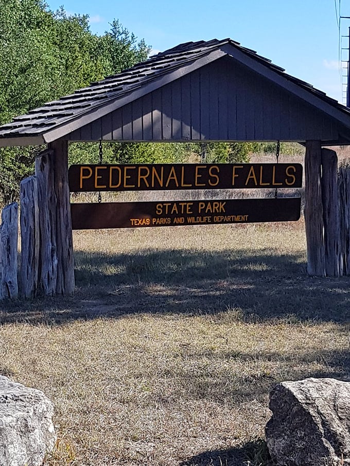 "Howdy, adventure!" This rustic sign is like a portal to a world where cell service fades and wonder takes over.