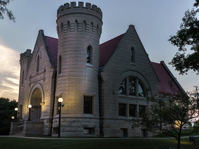As the sun sets, this bibliophile's dream castle glows like a beacon of knowledge. It's the closest thing to Cinderella's ballroom for book lovers.