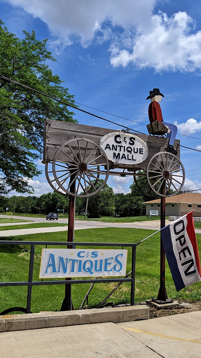 Giddy up, time travelers! This wagon wheel sign isn't just eye-catching &ndash; it's your portal to a world where every object tells a story.