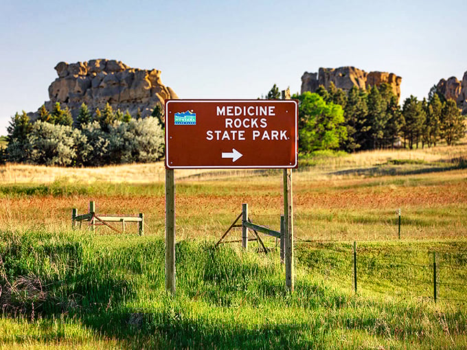 "This way to adventure!" The sign beckons, promising a journey through time and geology.
