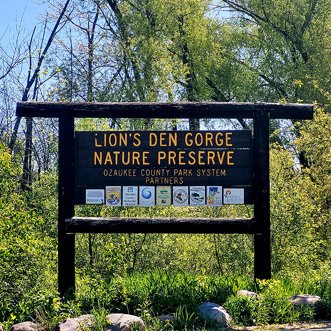 Welcome to Wisconsin's hidden gem! This sign marks the entrance to a world where nature puts on a show rivaling Broadway.
