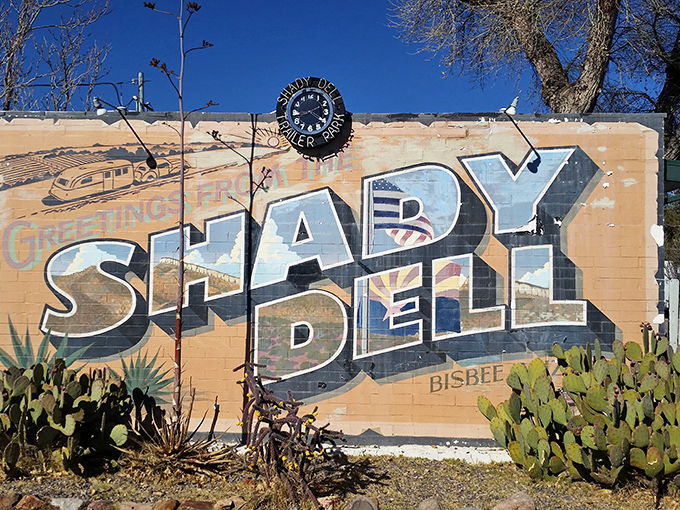 Greetings from the past! This mural is more than just a pretty face &ndash; it's a time machine disguised as street art. Who needs a DeLorean when you've got the Shady Dell?