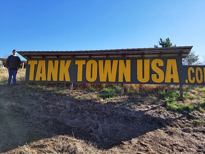 Welcome to Tank Town USA, where "rush hour" takes on a whole new meaning. This sign promises an adventure that's anything but ordinary.