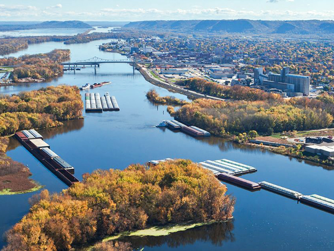 Winona from above: Nature's jigsaw puzzle. The Mississippi snakes through like a blue ribbon, tying this picturesque package together.