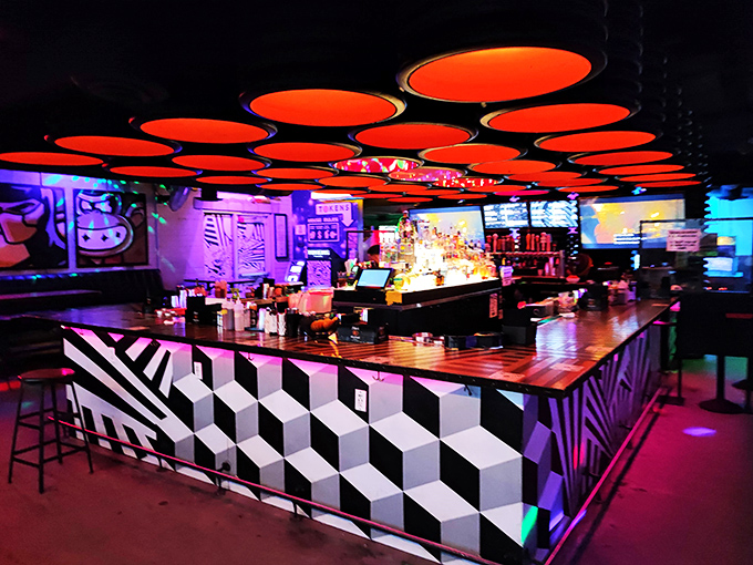 Welcome to the mothership of nostalgia! This bar's geometric patterns and pulsating lights make you feel like you're ordering drinks in Tron's local watering hole.