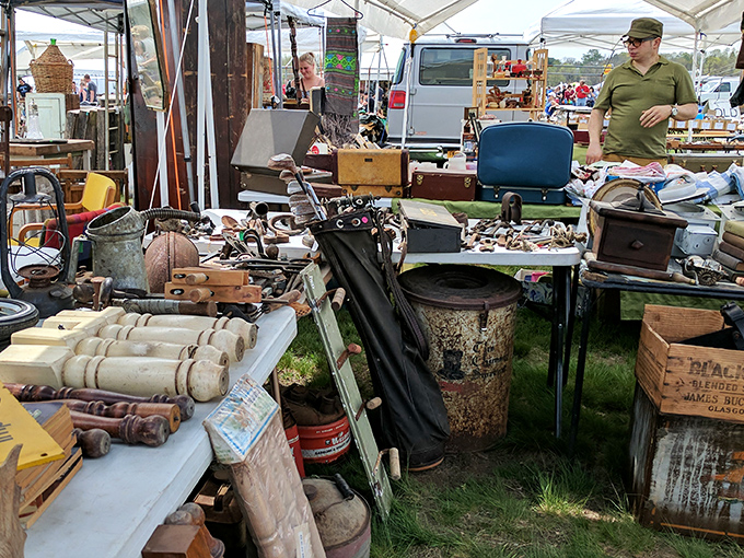 Grandma's attic meets Indiana Jones' storage unit. This booth is a time machine disguised as a jumble sale.