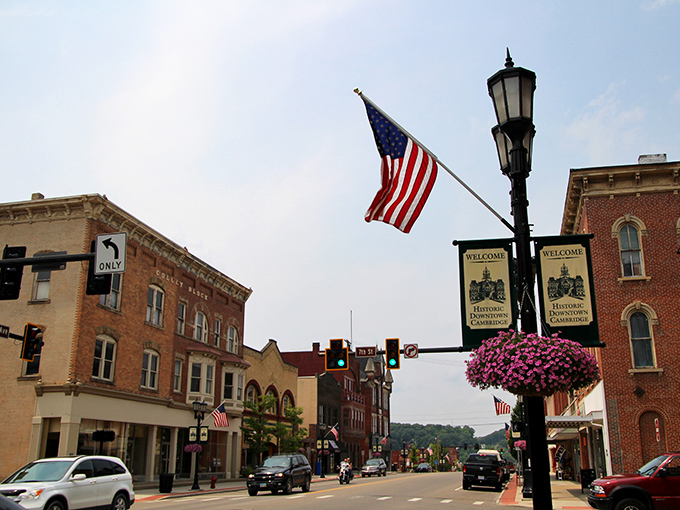 Stars, stripes, and small-town pride! Downtown Cambridge rolls out the red, white, and blue carpet, proving that patriotism isn't just for the Fourth of July. It's as American as apple pie... on a lamppost.
