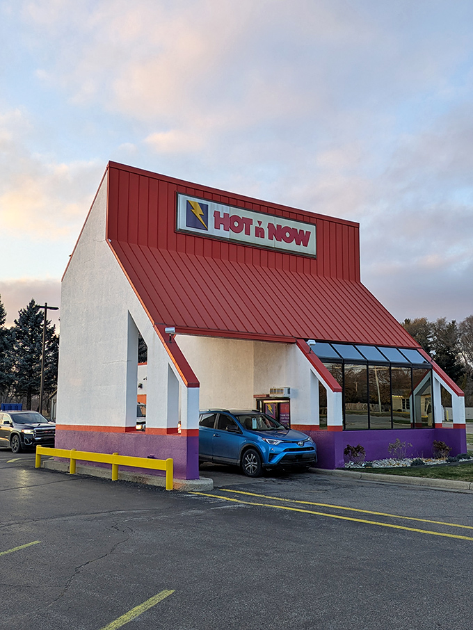 Drive-thru delight awaits! This A-frame wonder is like the Swiss Army knife of fast food - compact, efficient, and ready to satisfy any craving.