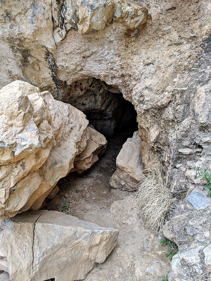 Knock knock! Who's there? Adventure, that's who. This unassuming entrance is your portal to a subterranean wonderland.