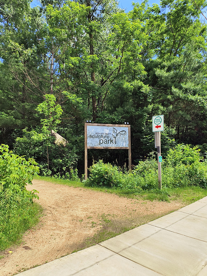 Welcome to Wonderland! This unassuming entrance is like Alice's rabbit hole, leading to a world of whimsical art and natural beauty.