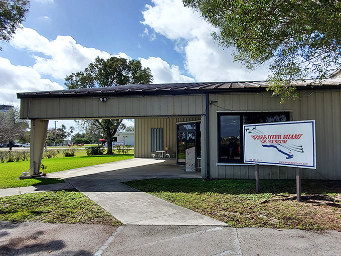 Welcome to the hangar of dreams! This unassuming entrance hides a treasure trove of aerial wonders waiting to be discovered.