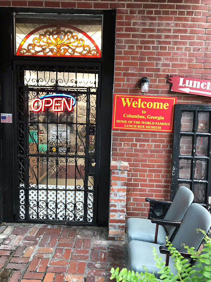 Knock knock! Who's there? Your inner child, ready to explore a world of retro lunchtime memories behind this charming brick facade.