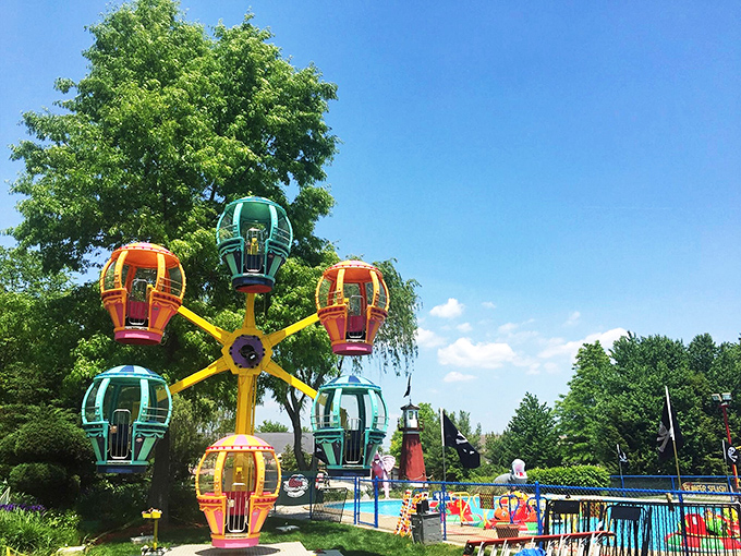 Up, up, and away! These vibrant sky pods are like floating jellybeans, offering a sweet taste of adventure with every rotation.