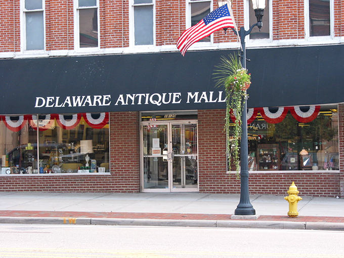 Stars, stripes, and vintage delights! This all-American storefront is like a Norman Rockwell painting come to life, inviting curiosity seekers to explore.