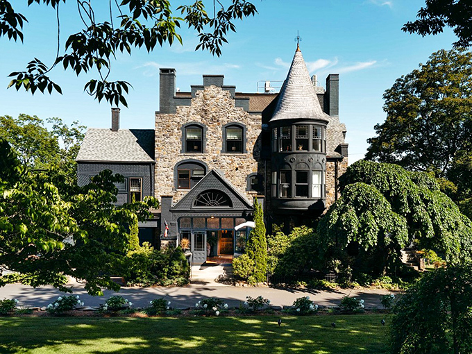 Rapunzel, Rapunzel, let down your... wait, wrong story. This storybook facade is pure New England charm with a dash of European flair.