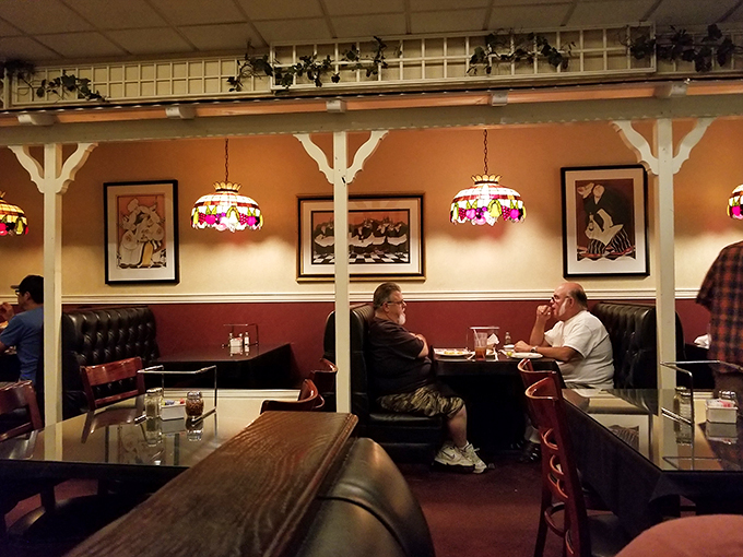 Tiffany lamps and cozy booths: where 'Mad Men' meets 'The Sopranos' for a slice of the good life. Don Draper would approve!