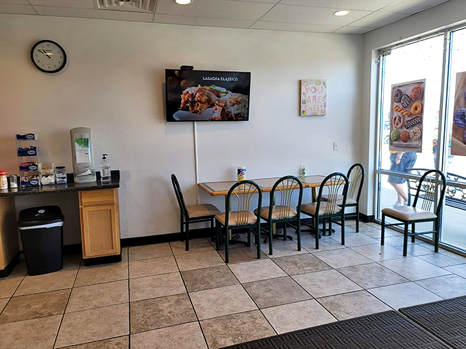 Cozy corners and the aroma of fresh coffee – this isn't just a donut shop, it's a morning sanctuary where calories don't count and smiles are served by the dozen.