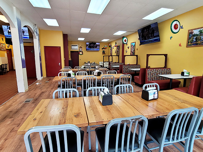 Step into a world where yellow walls and wooden tables create a cozy vibe. It's like a warm hug from your abuela, if she ran a taco joint.