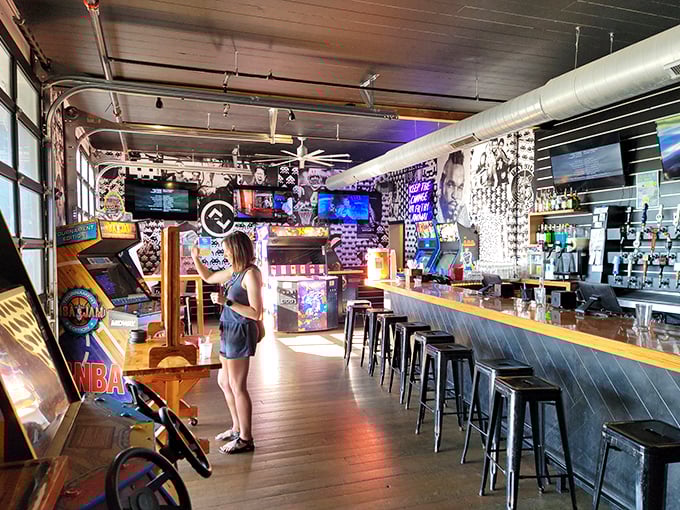 Step inside and let the sensory overload begin! This isn't just a bar; it's a time machine disguised as an arcade, with every beep and bloop a siren song of youth.