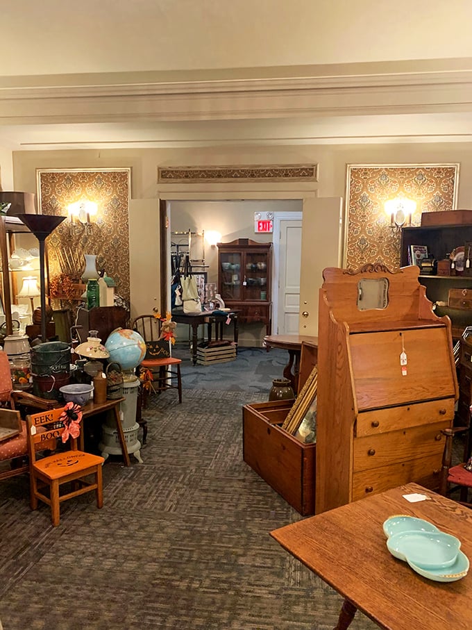 Step inside and prepare for sensory overload! This room is like your coolest grandma's attic, if your grandma collected everything from Victorian settees to lava lamps.