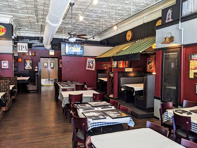 Step into a time capsule of Italian-American charm. Pat's interior is where checkered tablecloths meet family photos, and every corner whispers, "Mangia!"