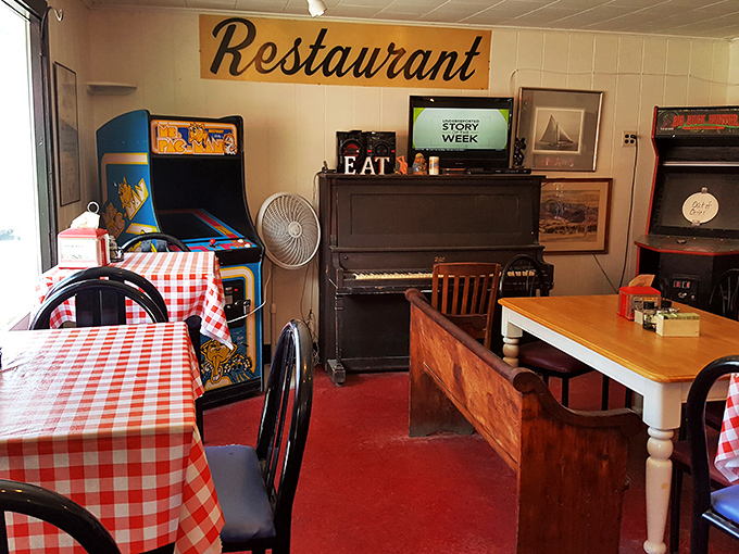 Step into a time machine of taste! This cozy interior blends nostalgia with comfort, complete with an arcade game for your inner child.