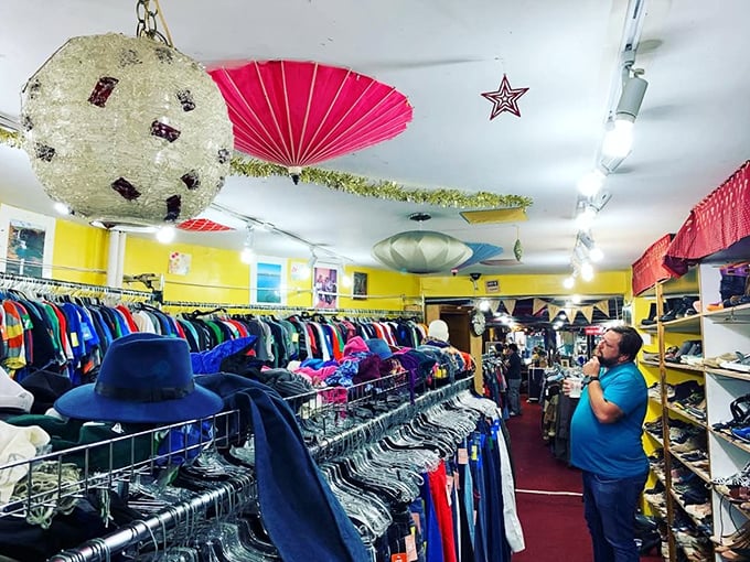 Step inside and prepare for sensory overload! The ceiling decor alone is like a party thrown by unicorns and disco balls.