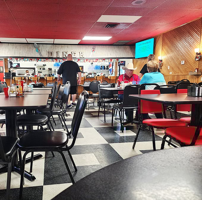 Step into a time warp where the coffee's always hot and the conversation's always lively. This diner's checkerboard floor is just begging for a sock hop!
