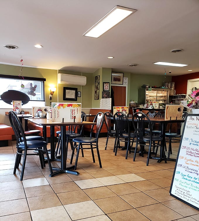 Step into a time capsule of comfort! This cozy interior is where memories are made and pancake dreams come true. It's like grandma's kitchen, but with better coffee.
