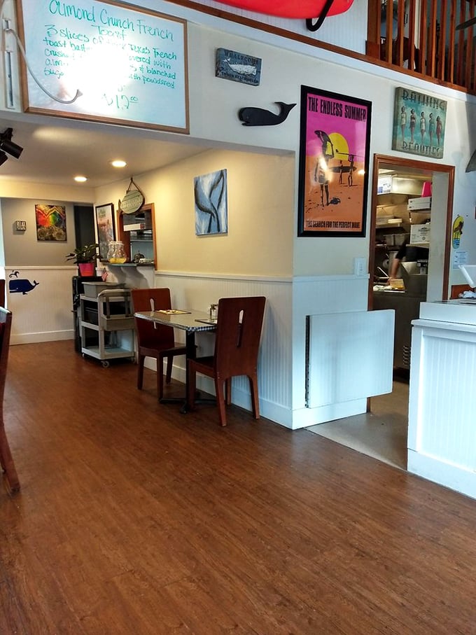 Step inside and feel the warmth! With its eclectic beach-themed decor and inviting atmosphere, this interior screams "come in, sit down, and stay awhile."