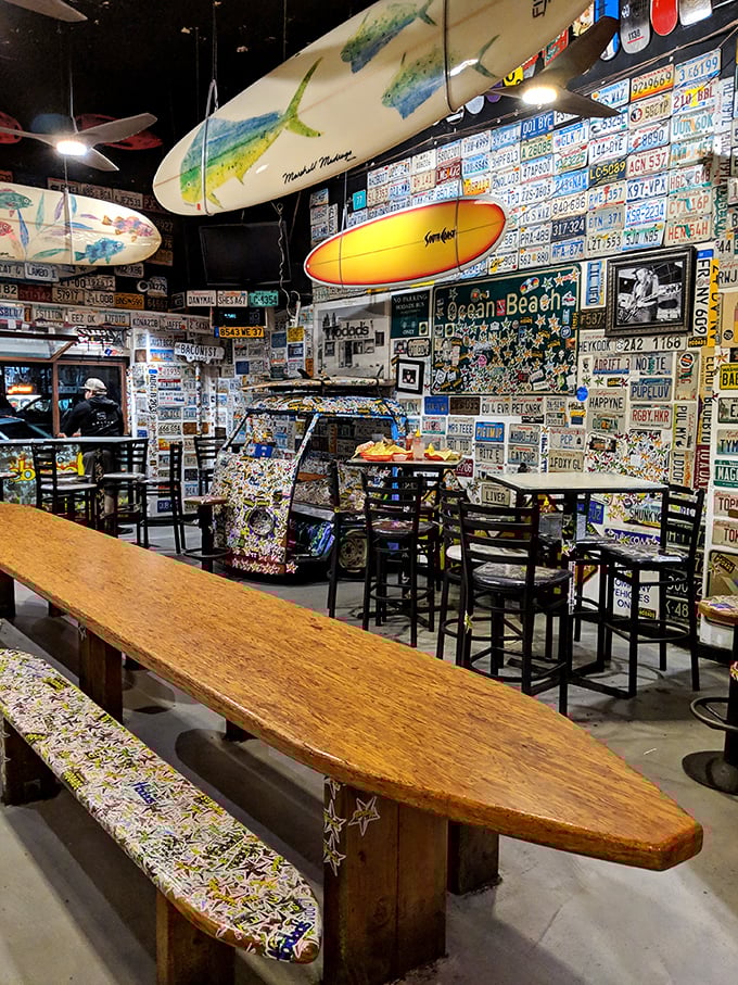 Step inside and prepare for sensory overload. Surfboards and license plates create a roadtrip-meets-beach-party vibe that'll make you forget your indoor voice.
