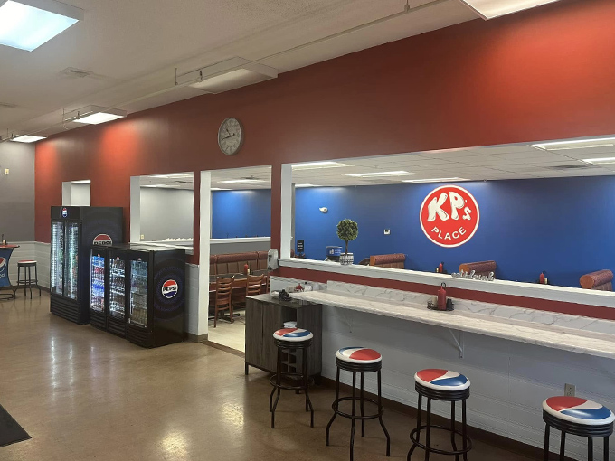 Step inside and feel the warmth! KP's interior is a vibrant mix of red, white, and blue &ndash; as American as the comfort food they serve.
