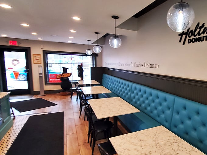 Step into donut paradise! Sleek blue booths and marble tables set the stage for your sugar-coated adventure at Holtman's.