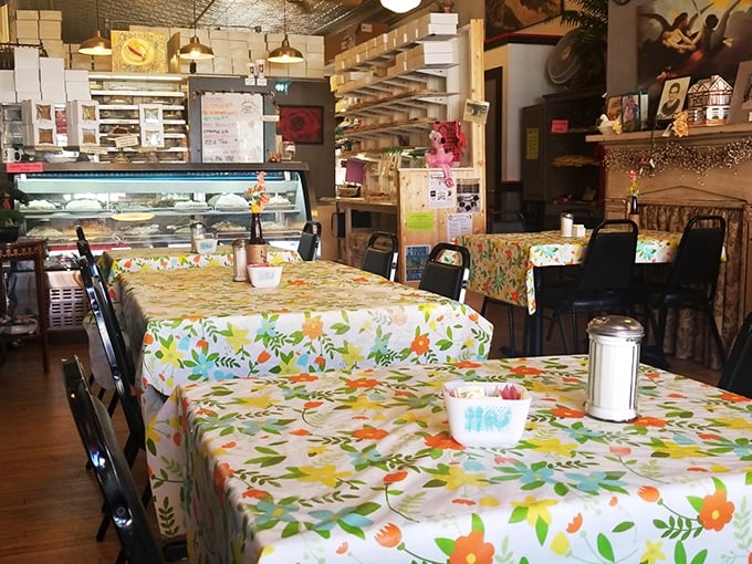 Floral tablecloths and mismatched chairs? Check! This cozy interior is where comfort food meets grandma's living room &ndash; in the best way possible.