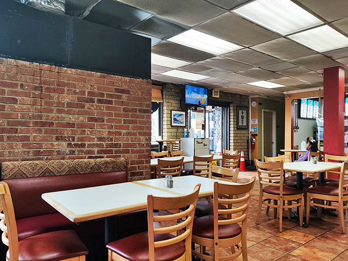 Step into a time capsule of comfort! The brick walls and wooden chairs whisper tales of countless satisfied diners who've come before you.