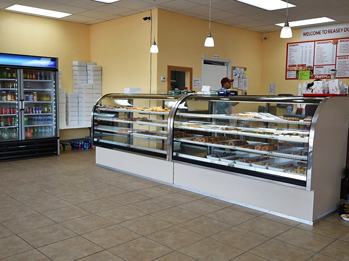 Step into donut paradise! Reasey's gleaming display cases are like a treasure chest of fried dough jewels, each more tempting than the last.