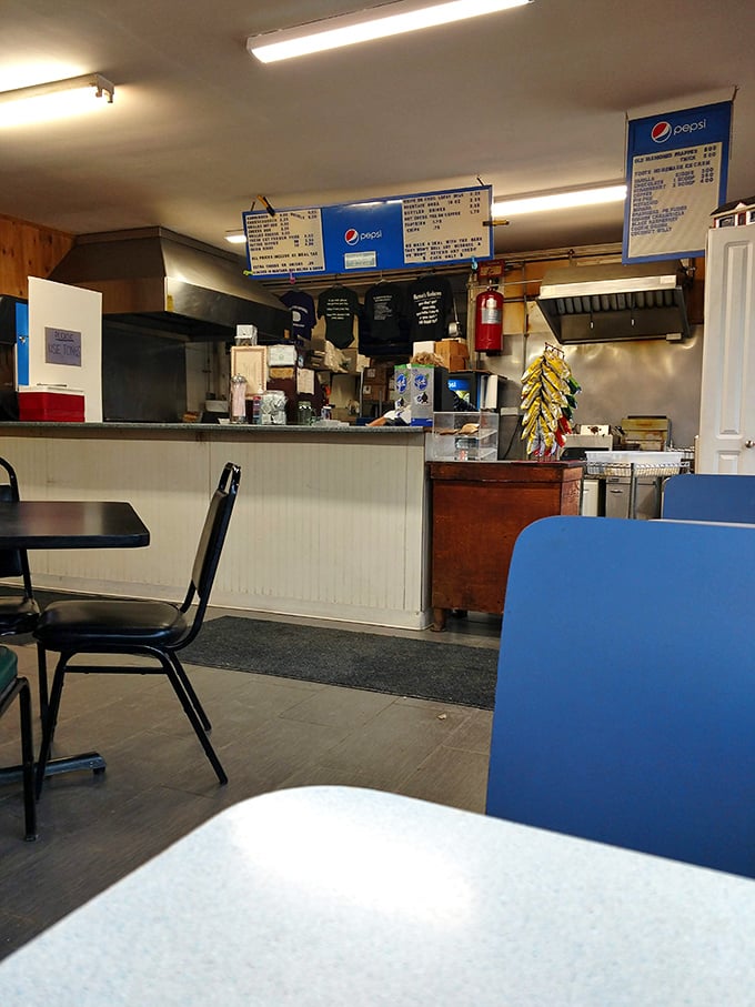 Step into burger paradise! This no-frills interior whispers tales of countless satisfied customers and decades of griddled perfection.