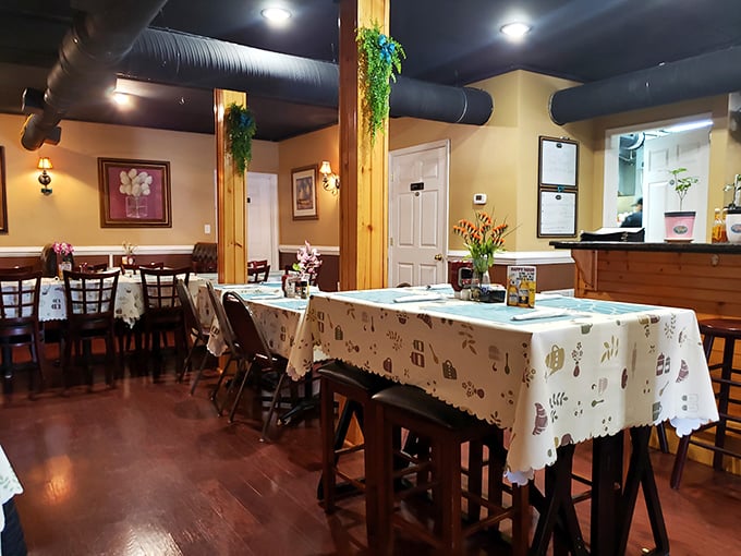 Step inside and feel the cozy vibes wash over you. With warm wood tones and charming tablecloths, it's like dining in grandma's living room &ndash; if grandma were a culinary genius.