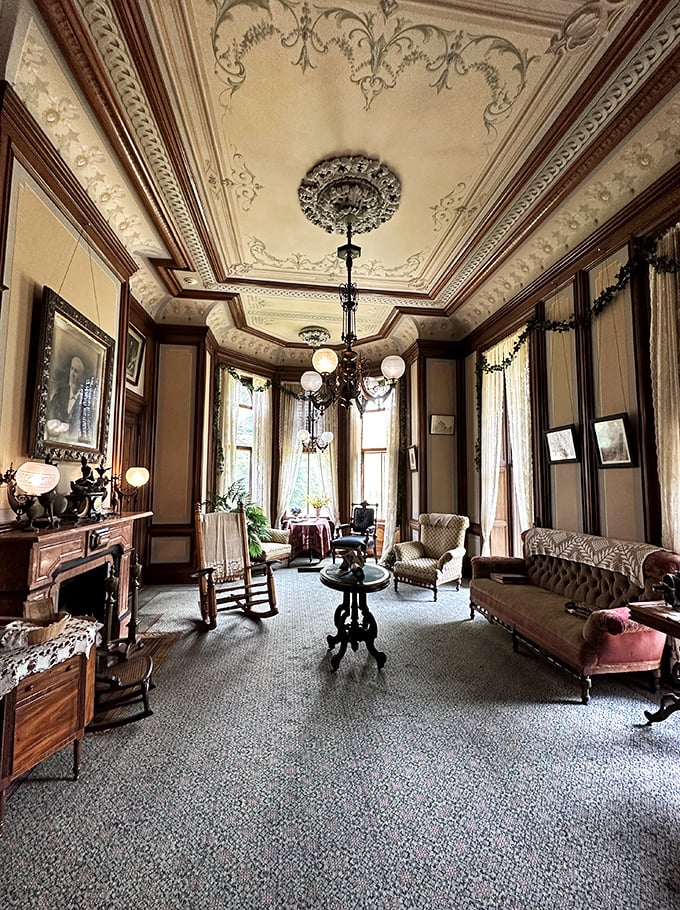 Honey, I shrunk the ballroom! This cozy parlor whispers tales of bygone soir&eacute;es, its ornate ceiling keeping a watchful eye on modern-day visitors.