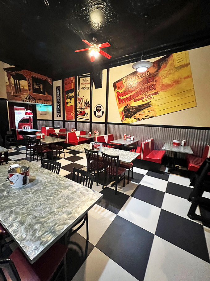 Step inside and suddenly you're Marty McFly, minus the DeLorean. The checkered floor and retro posters scream '50s louder than a jukebox full of Elvis hits.